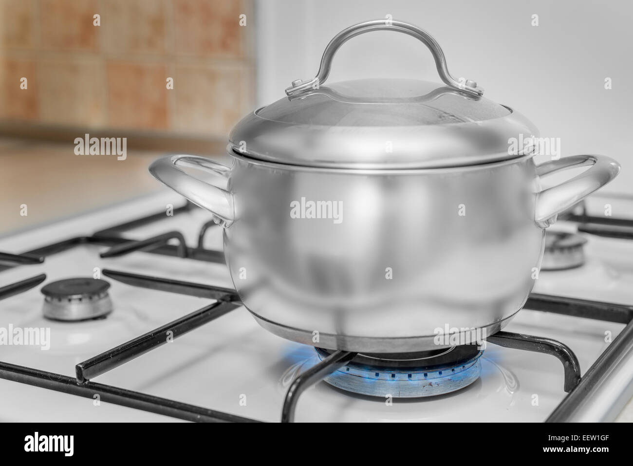Pot on top stove blue hi-res stock photography and images - Alamy