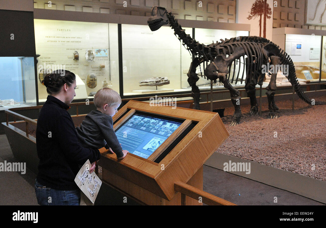 New Haven-- Rebecca Stearns, and her son, Jack, 3, look over the ...