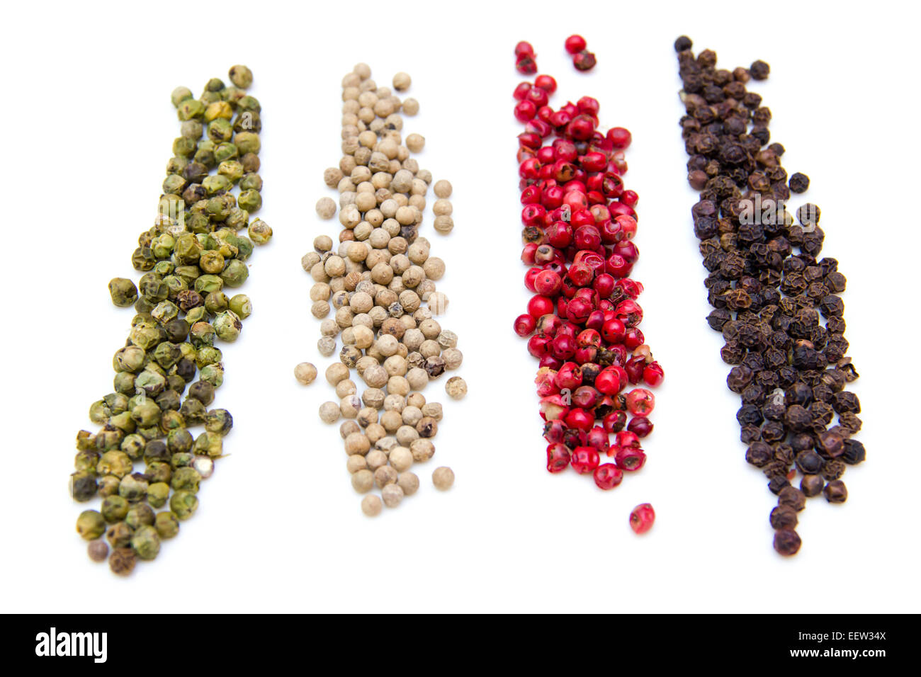 Strips of mixed peppers on white background Stock Photo - Alamy