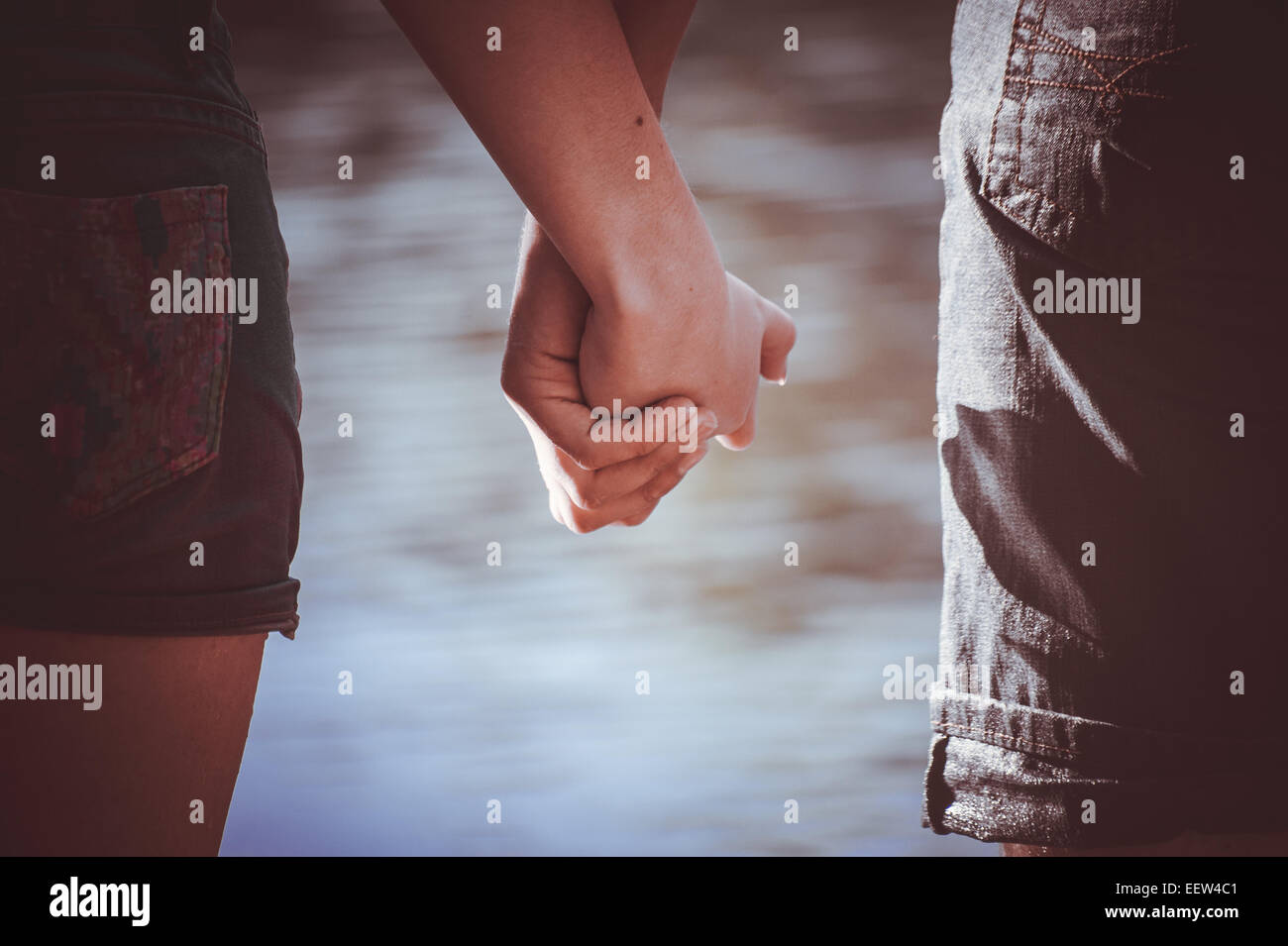 boy and girl hold hands no face Stock Photo - Alamy