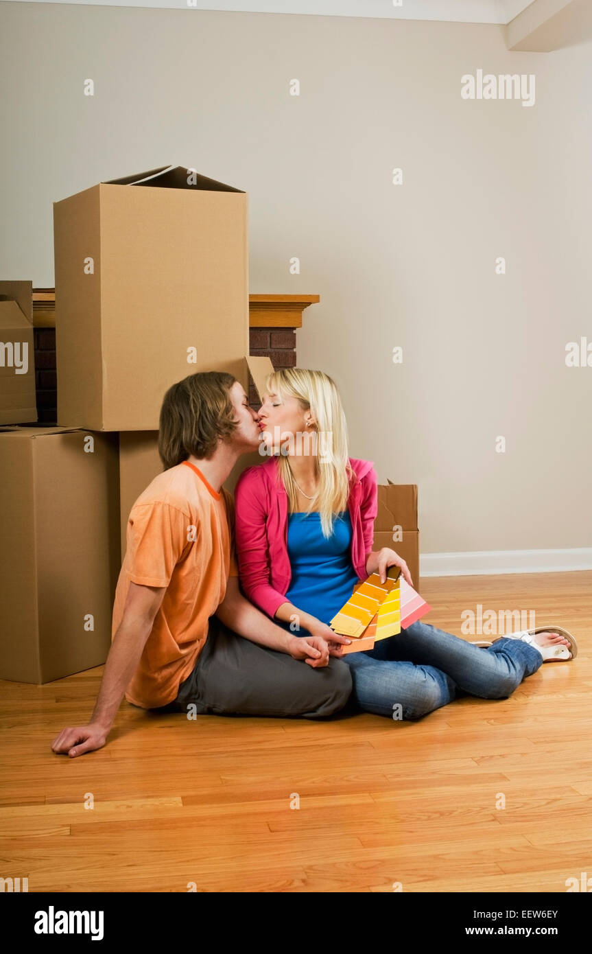 Young man looking at color swatch 20 29 years hi-res stock photography ...