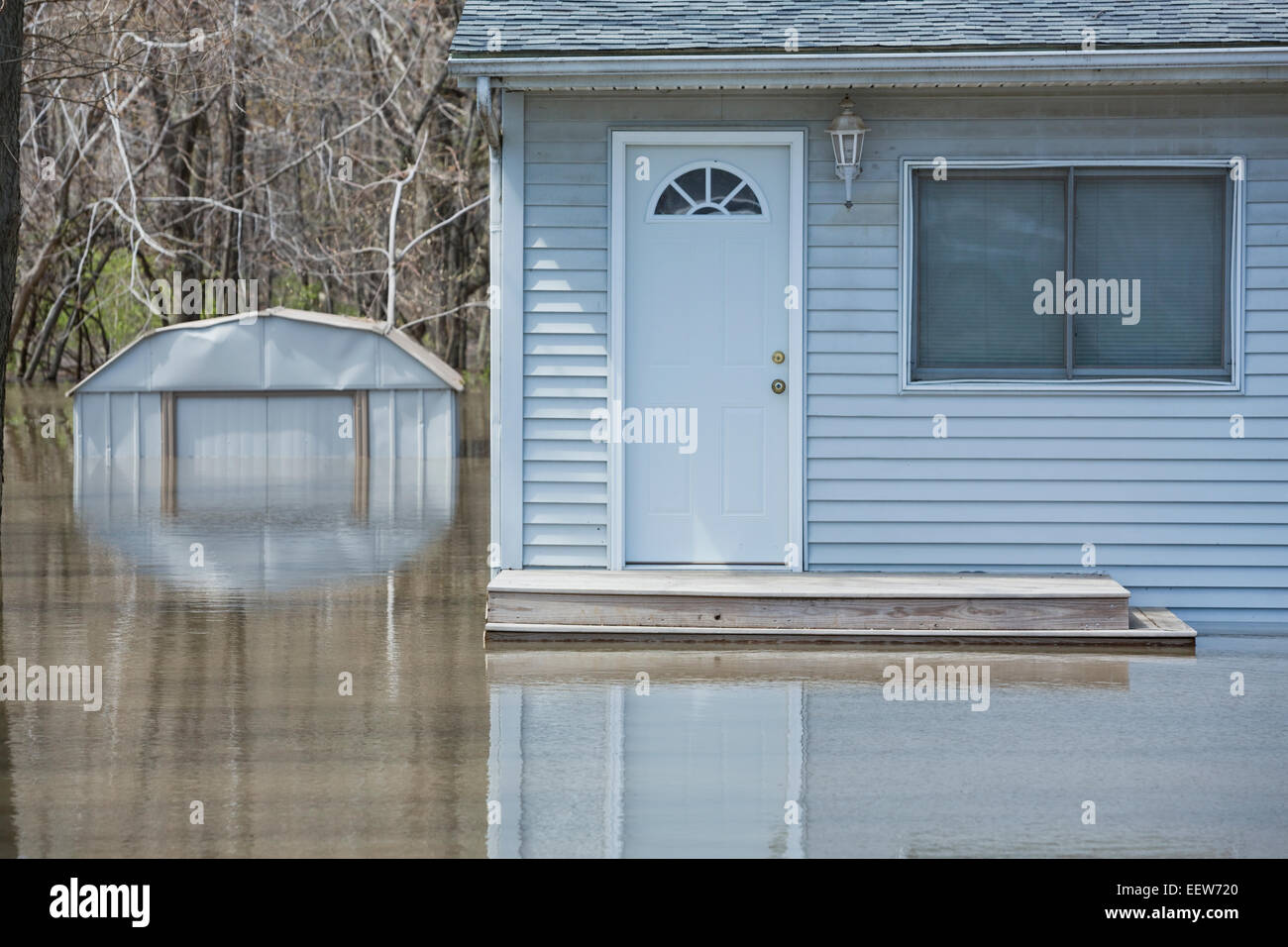 Facade of flooded house Stock Photo - Alamy