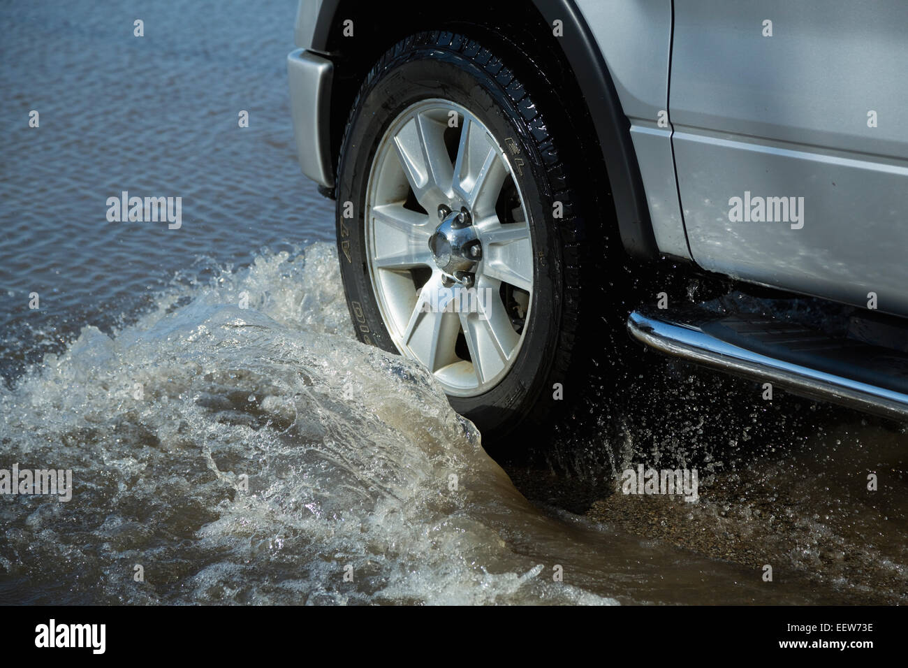 Car splashing people hi-res stock photography and images - Alamy