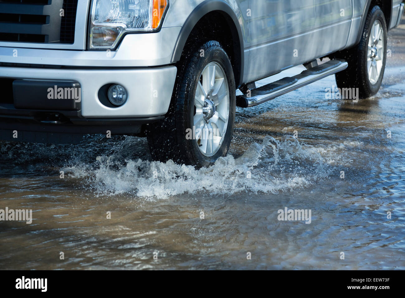 Car driving up street hi-res stock photography and images - Alamy
