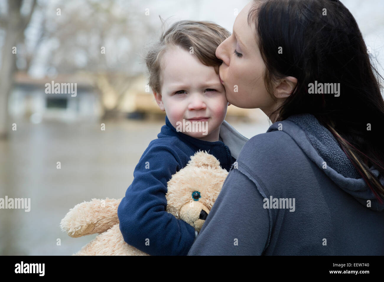 Mother carries son in hi-res stock photography and images - Alamy