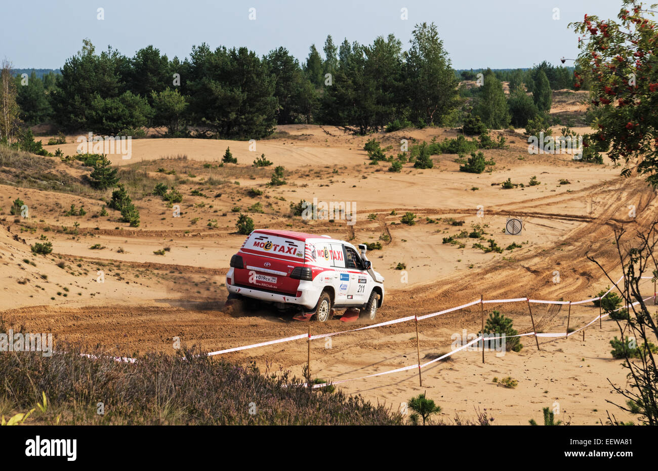 Races on a rally-raid on sandy dunes. Rally-raid Baha "Belarus" 2014 ...