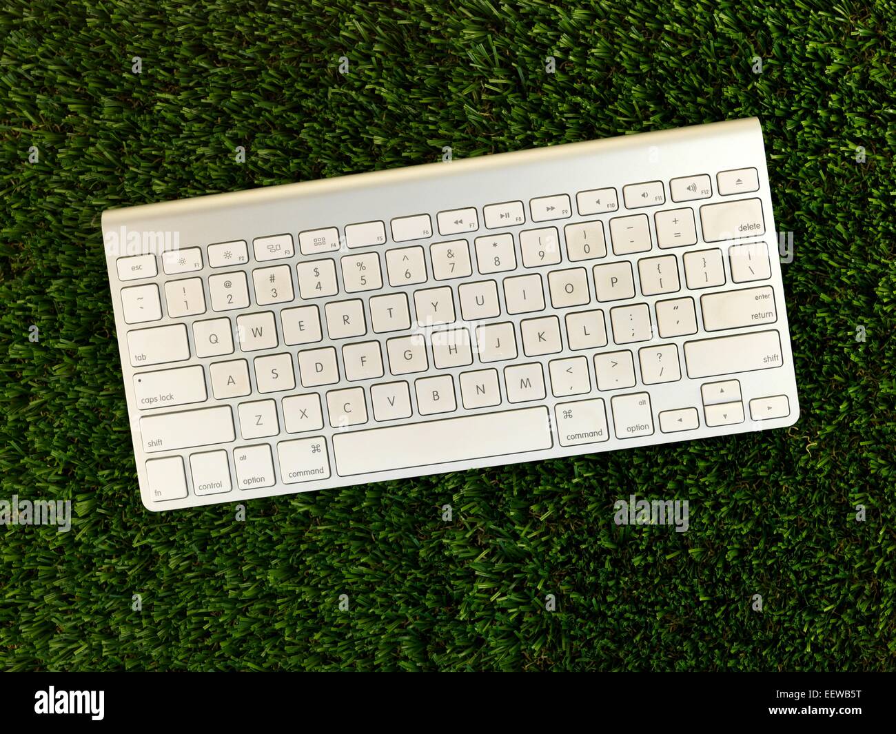 A computer keyboard on artificial grass Stock Photo - Alamy