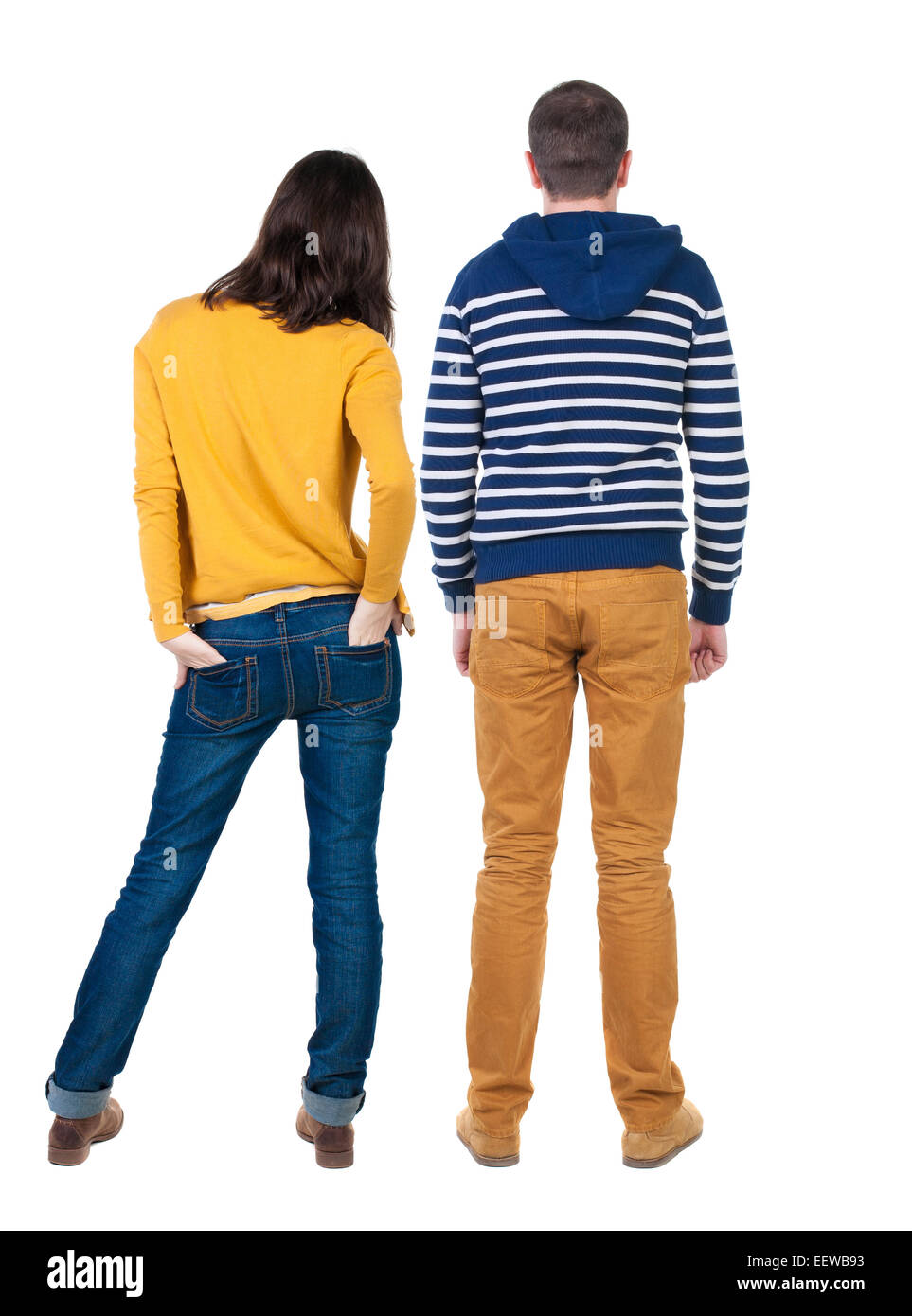 Back view of young couple hug and look into the distance. beautiful ...