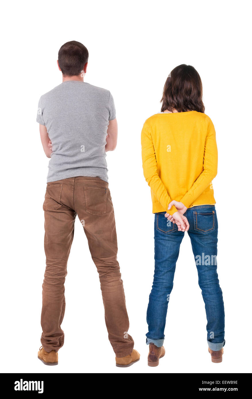 Back view of young couple hug and look into the distance. beautiful ...