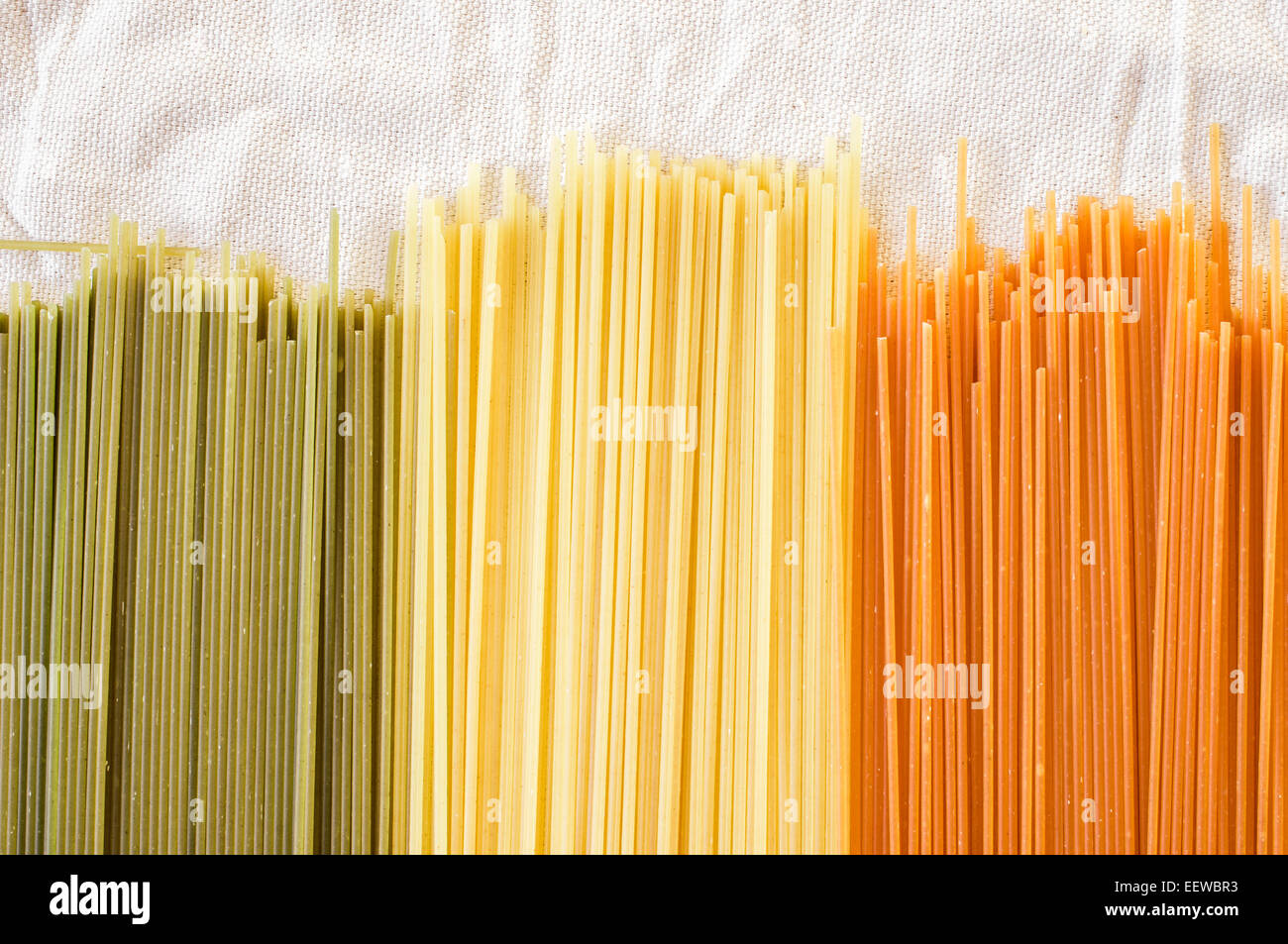 Spaghetti pasta in the colors of the Italian flag Stock Photo - Alamy