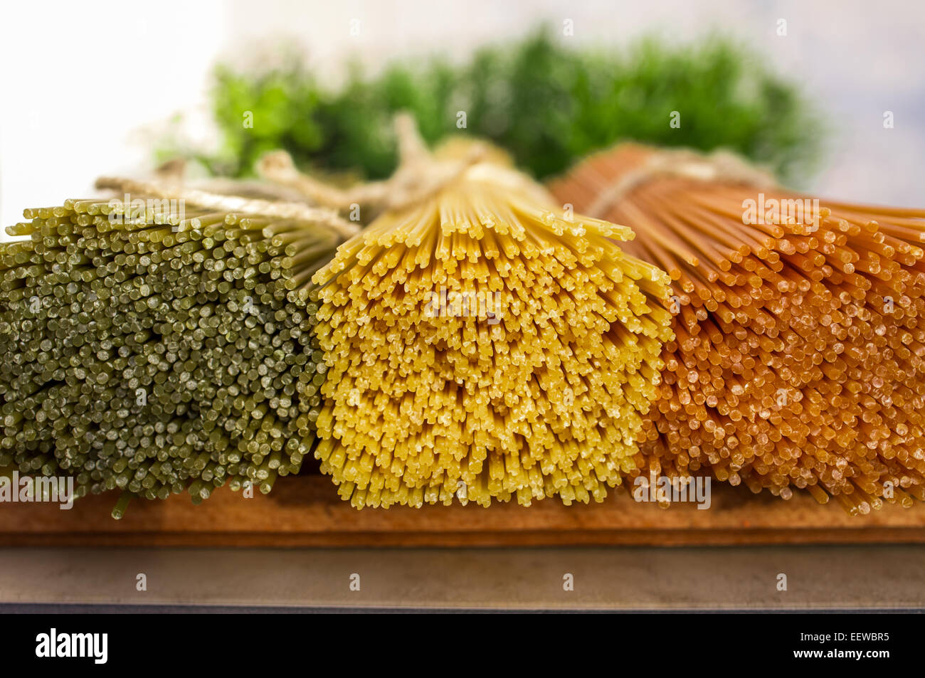 Spaghetti pasta in the colors of the Italian flag Stock Photo - Alamy
