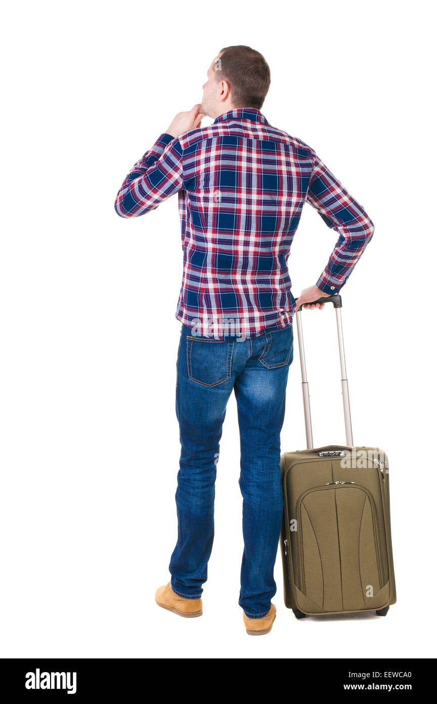 Back view of man with green suitcase looking up. Rear view people ...