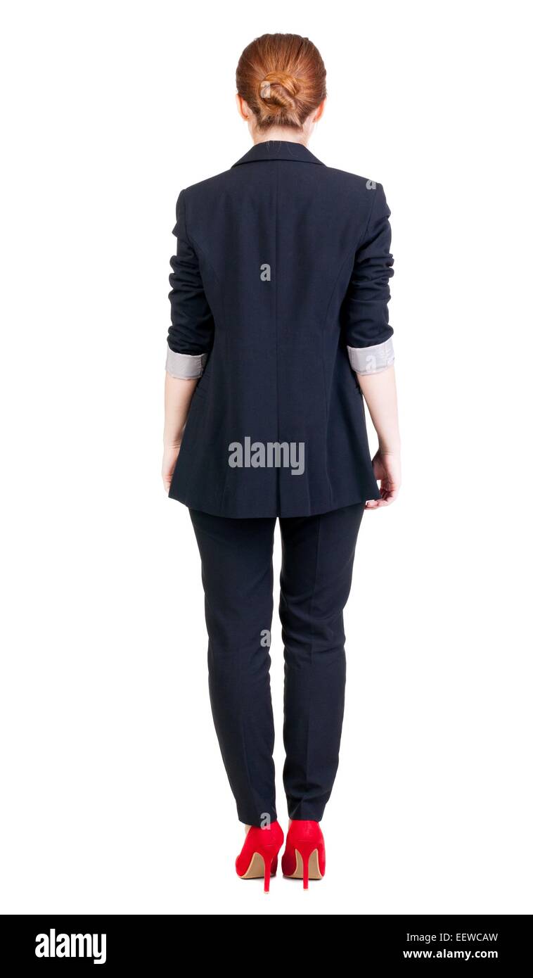 back view of redhead business woman contemplating. Young girl in suit ...