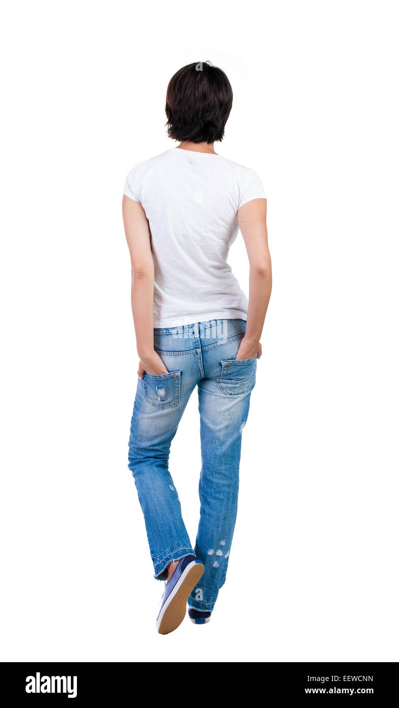 back view of standing young beautiful brunette woman. girl watching ...