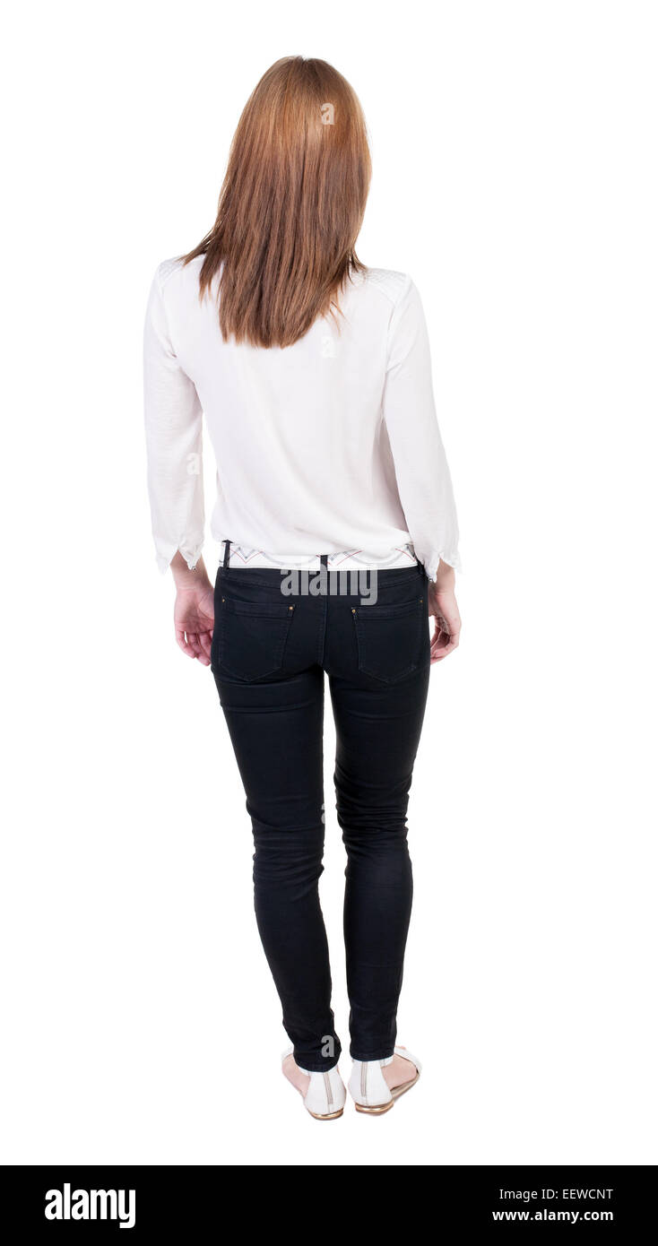 back view of standing young beautiful brunette woman. girl watching ...