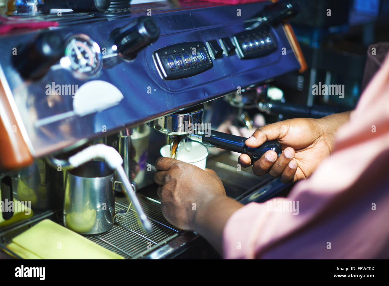 Male hands during making coffee Stock Photo - Alamy