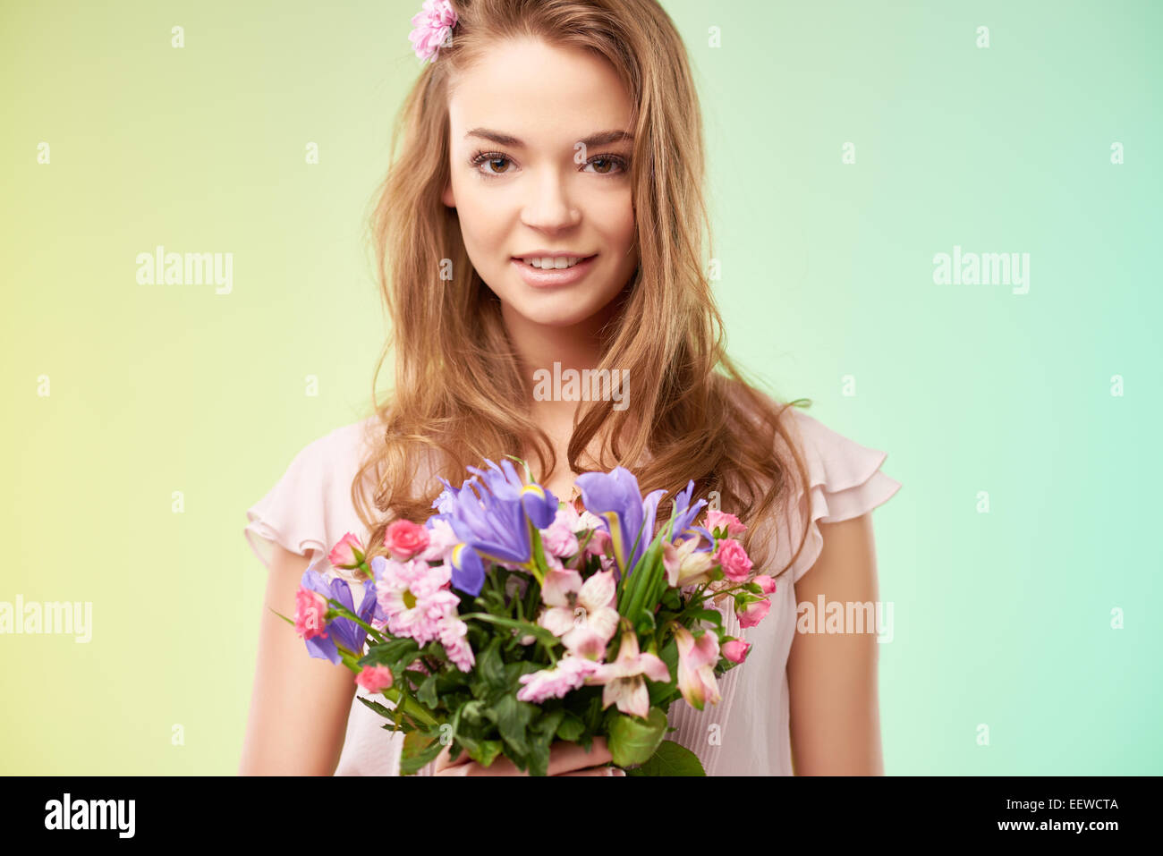 Cute girl with flowers hi-res stock photography and images - Alamy
