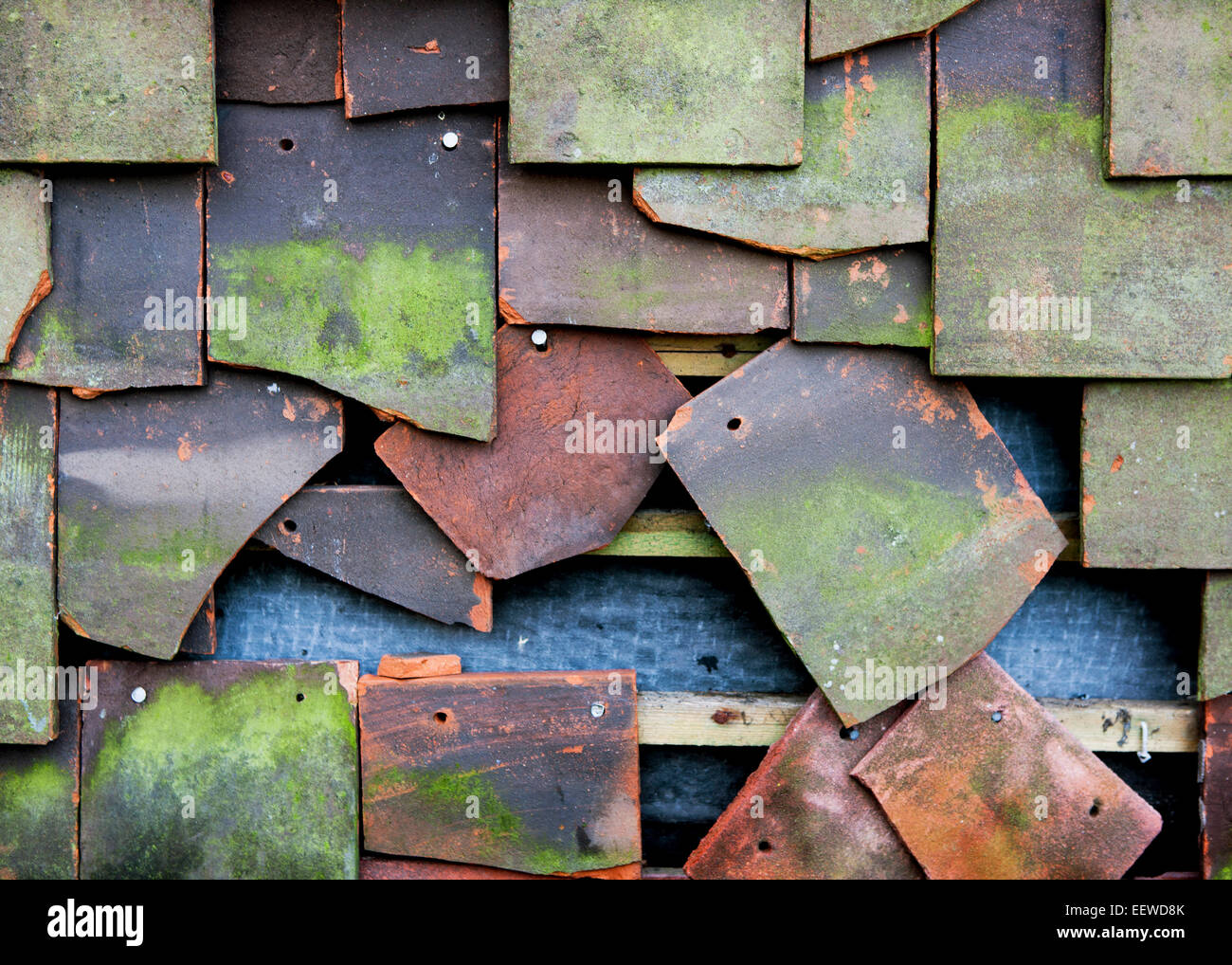 Broken ramshackled roof tiles Stock Photo - Alamy