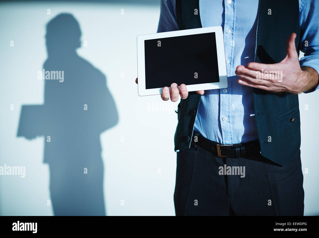 Male employee pointing at touchscreen Stock Photo - Alamy