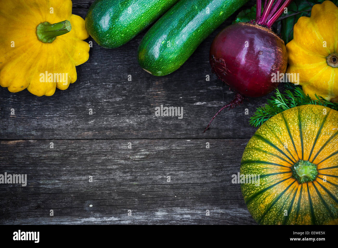 Fresh organic seasonal vegetables - pumpkin, squash, beetroot on wooden ...