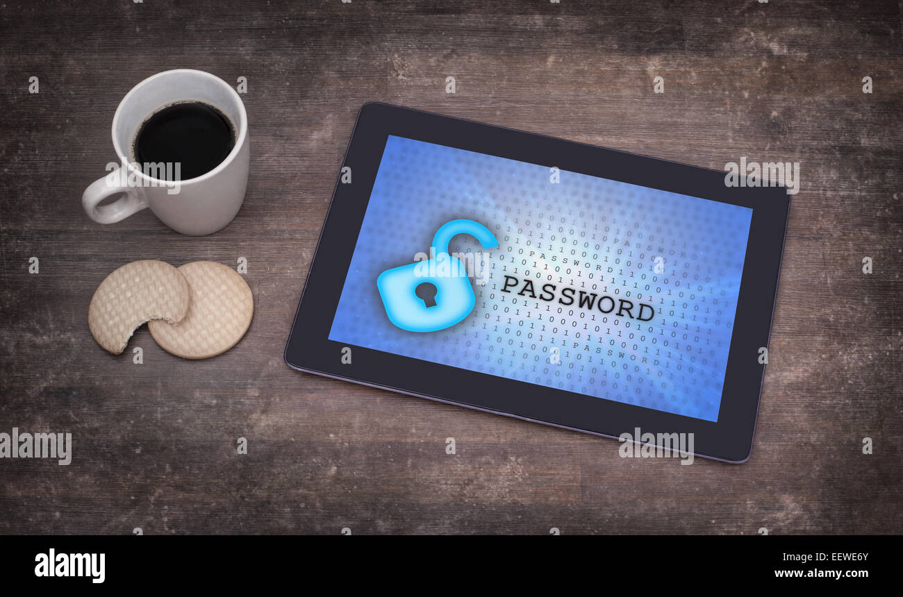 Tablet on a desk, concept of data protection, blue Stock Photo - Alamy