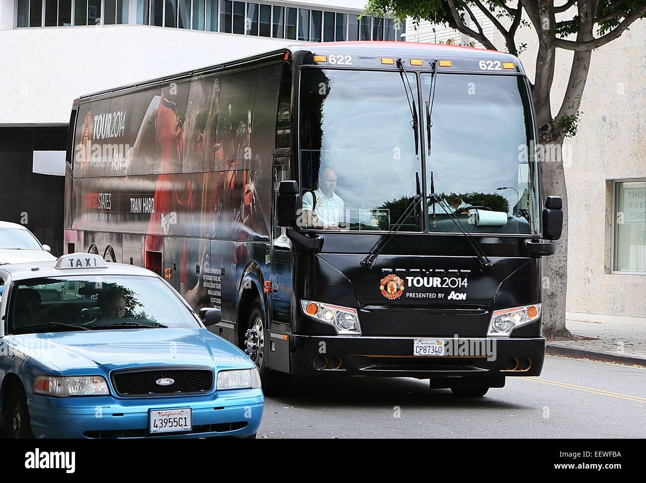 Wayne Rooney signs autographs for fans as he returns to the Manchester ...