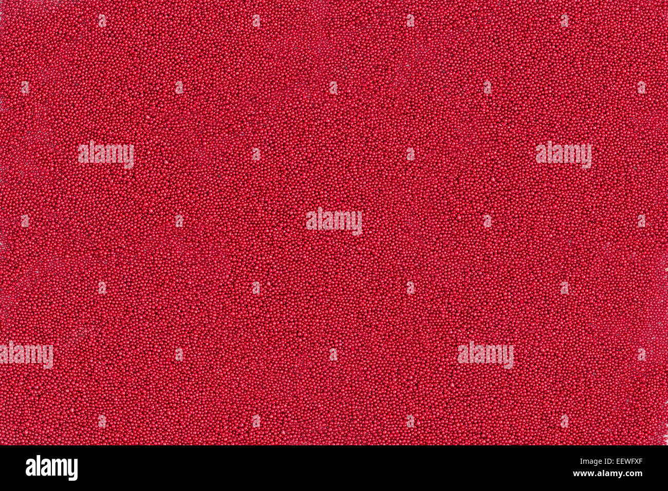 Background of tiny red metallic balls Stock Photo - Alamy