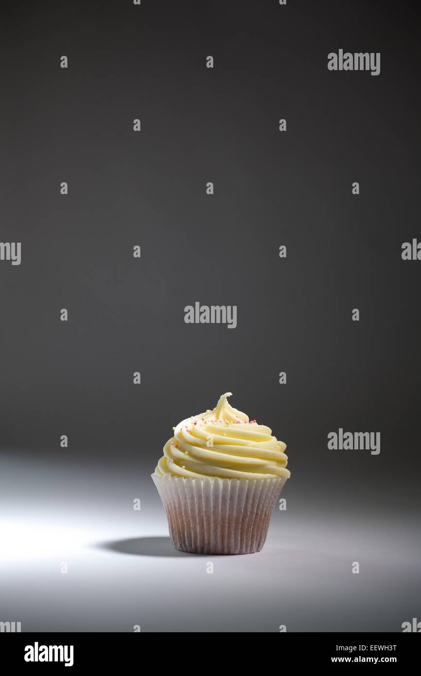 single cup cake on table Stock Photo - Alamy