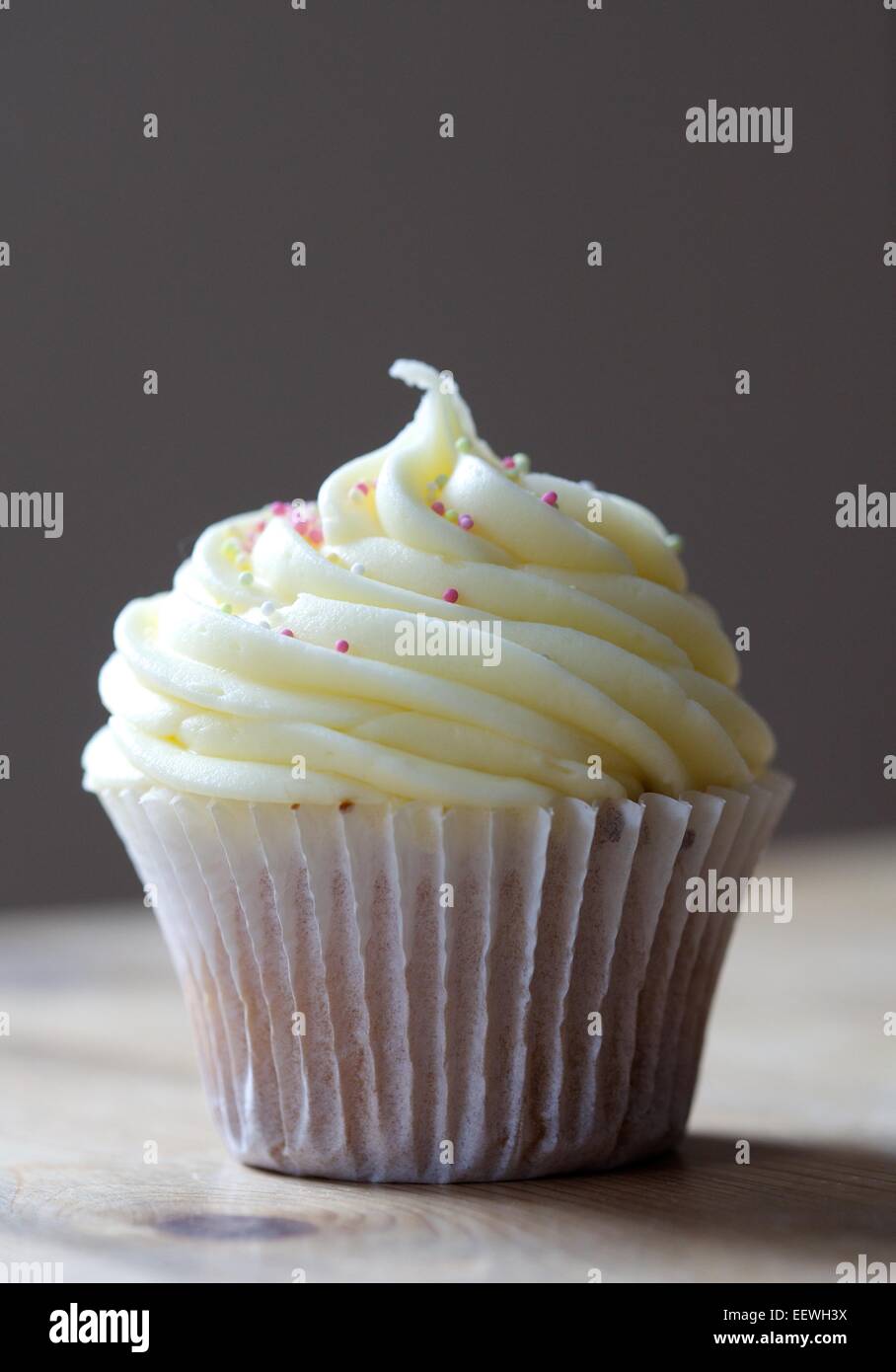 single cup cake on table Stock Photo - Alamy