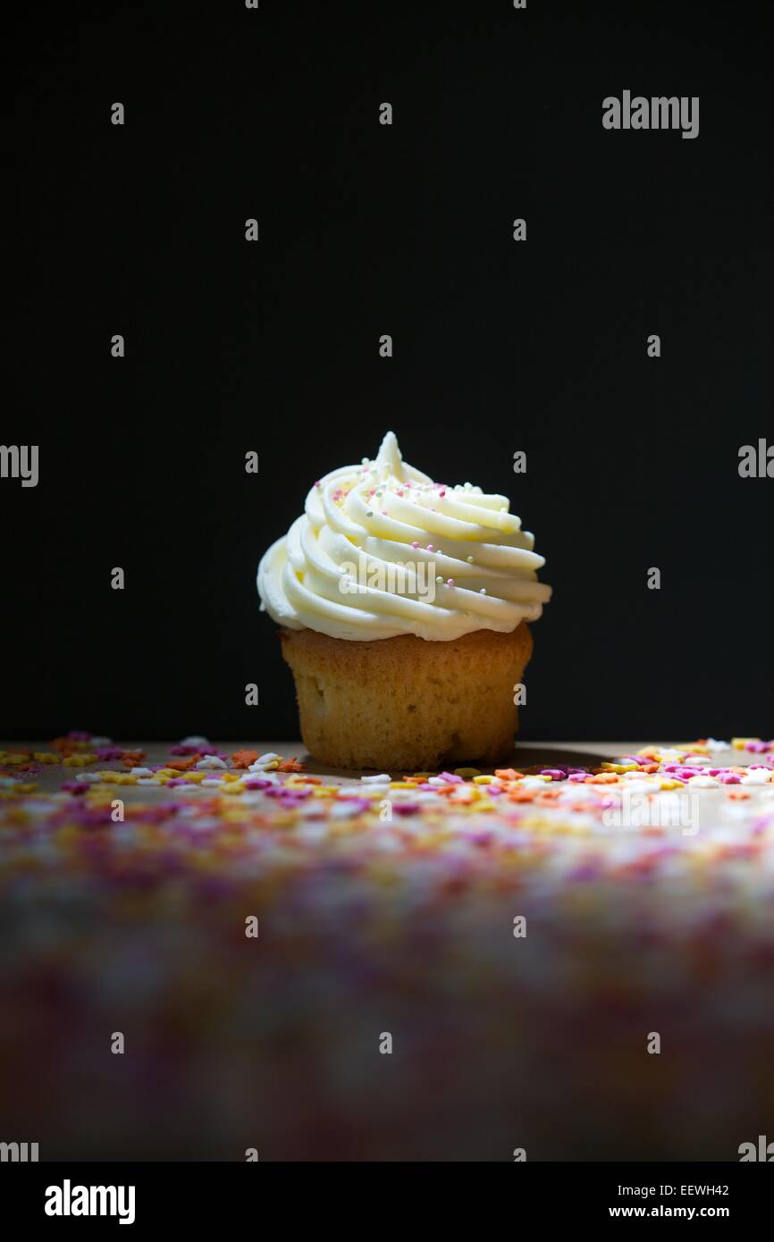 single cup cake on table Stock Photo - Alamy