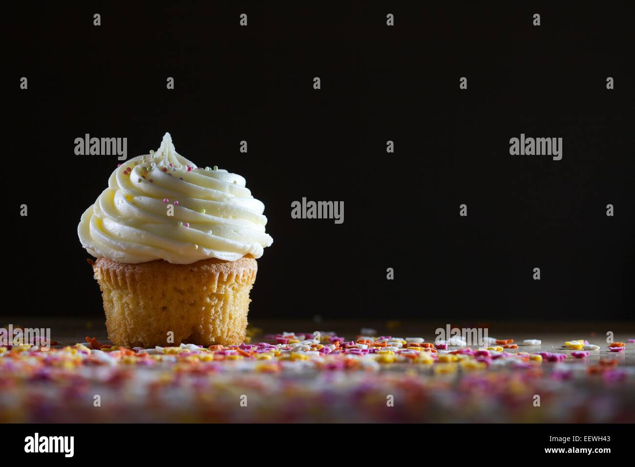 single cup cake on table Stock Photo - Alamy