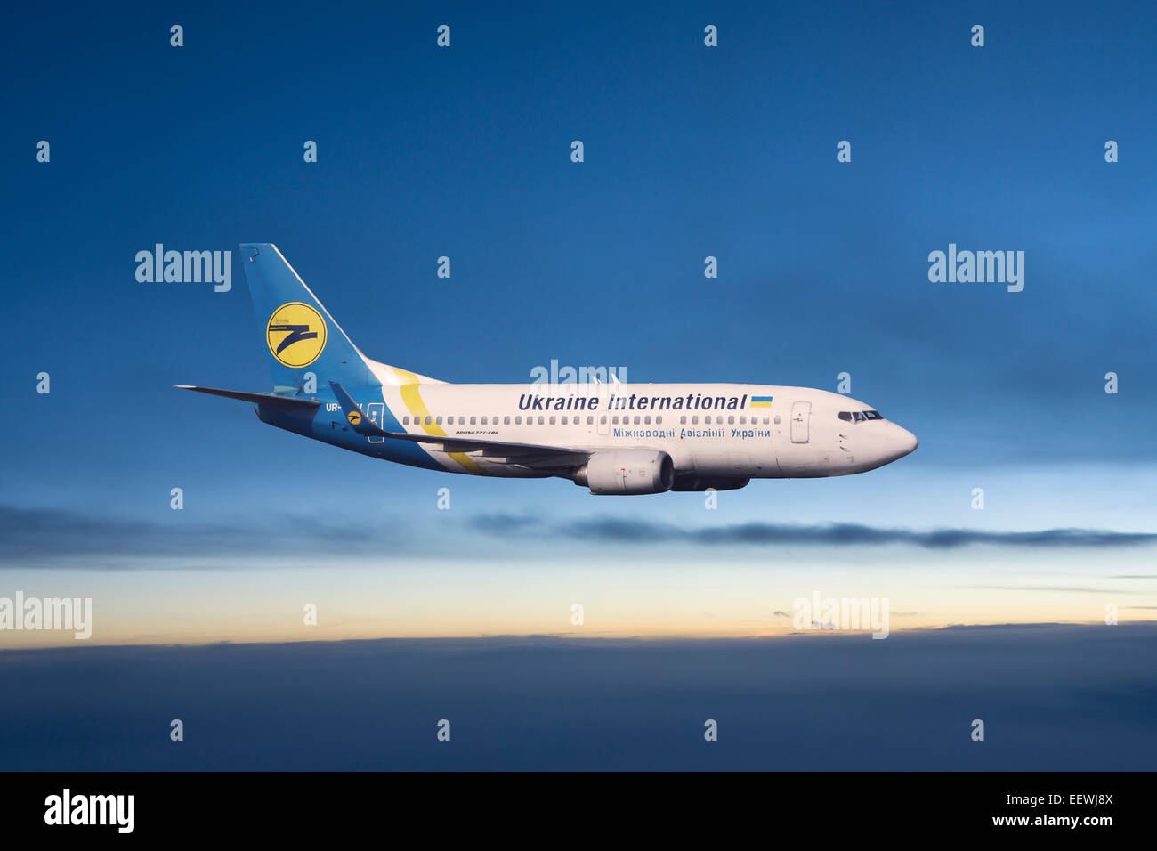Ukraine International Airlines, Boeing 737-500 in flight in the evening ...