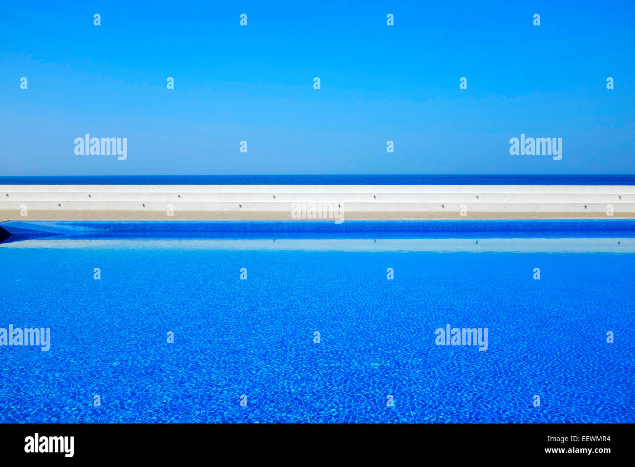 Minimalistic shot of a pool overlooking the sea Stock Photo - Alamy