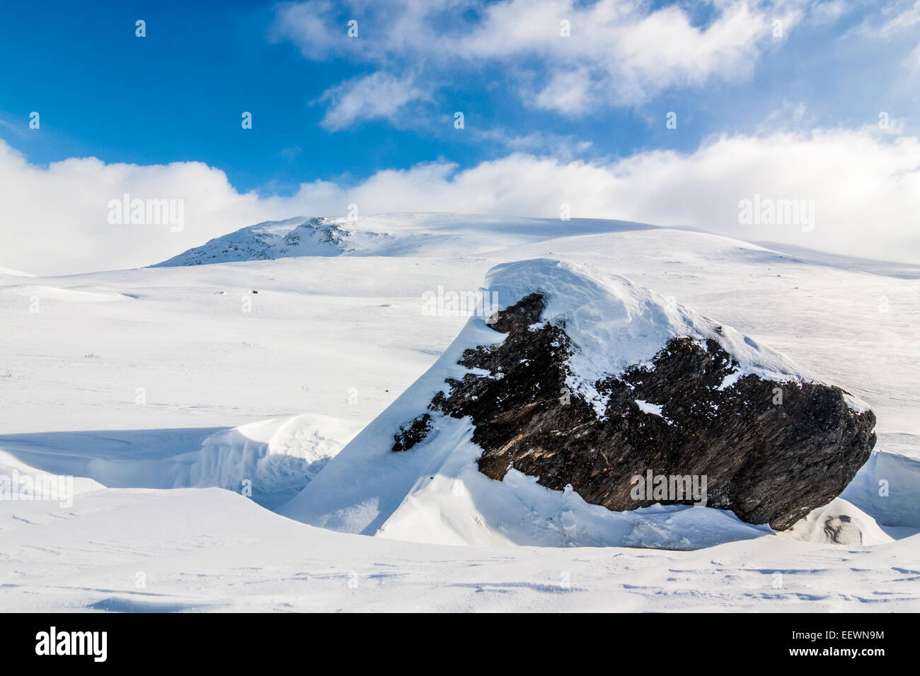 A boulder covered in snow Stock Photo - Alamy