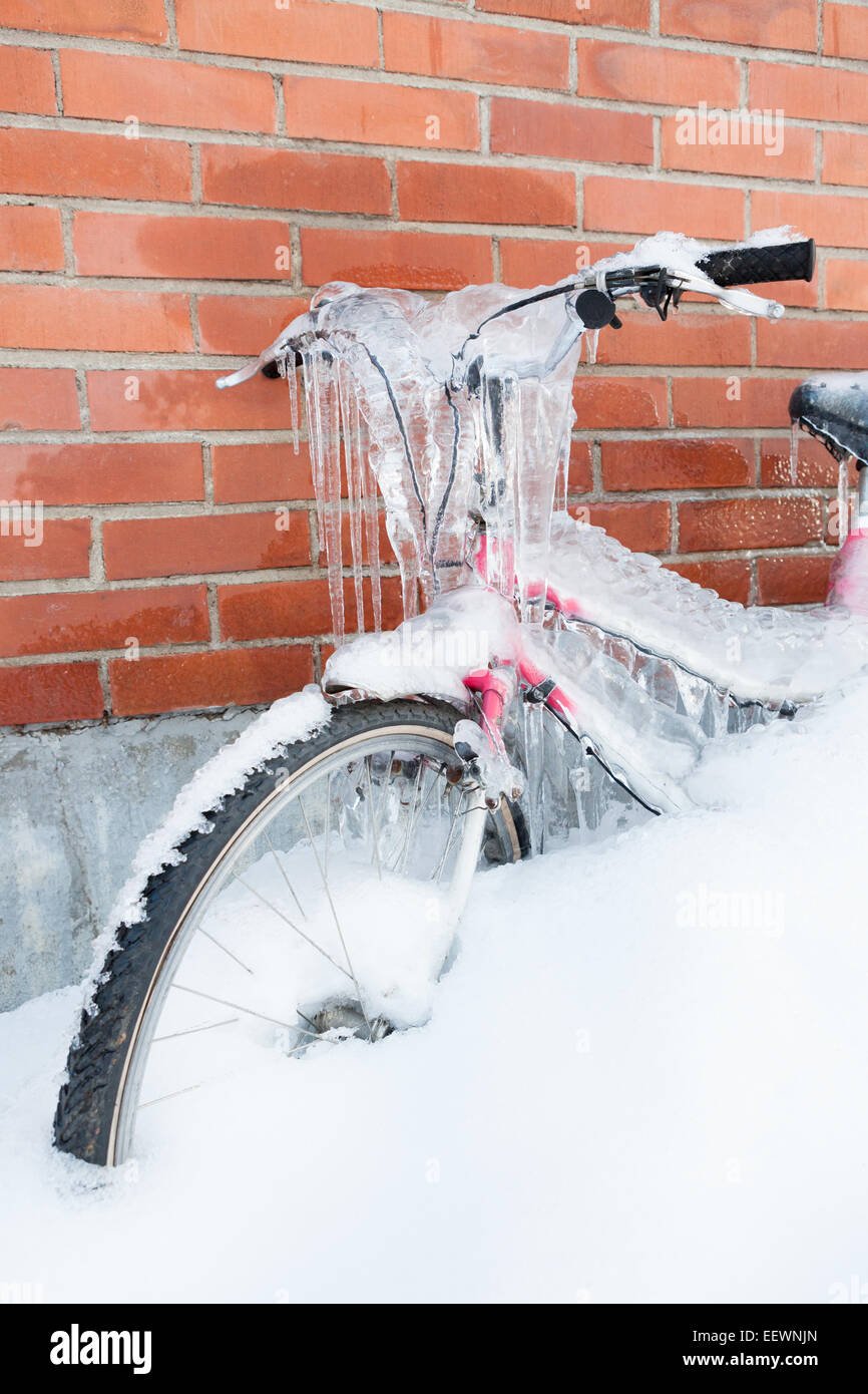 Frozen bike covered in ice Stock Photo - Alamy