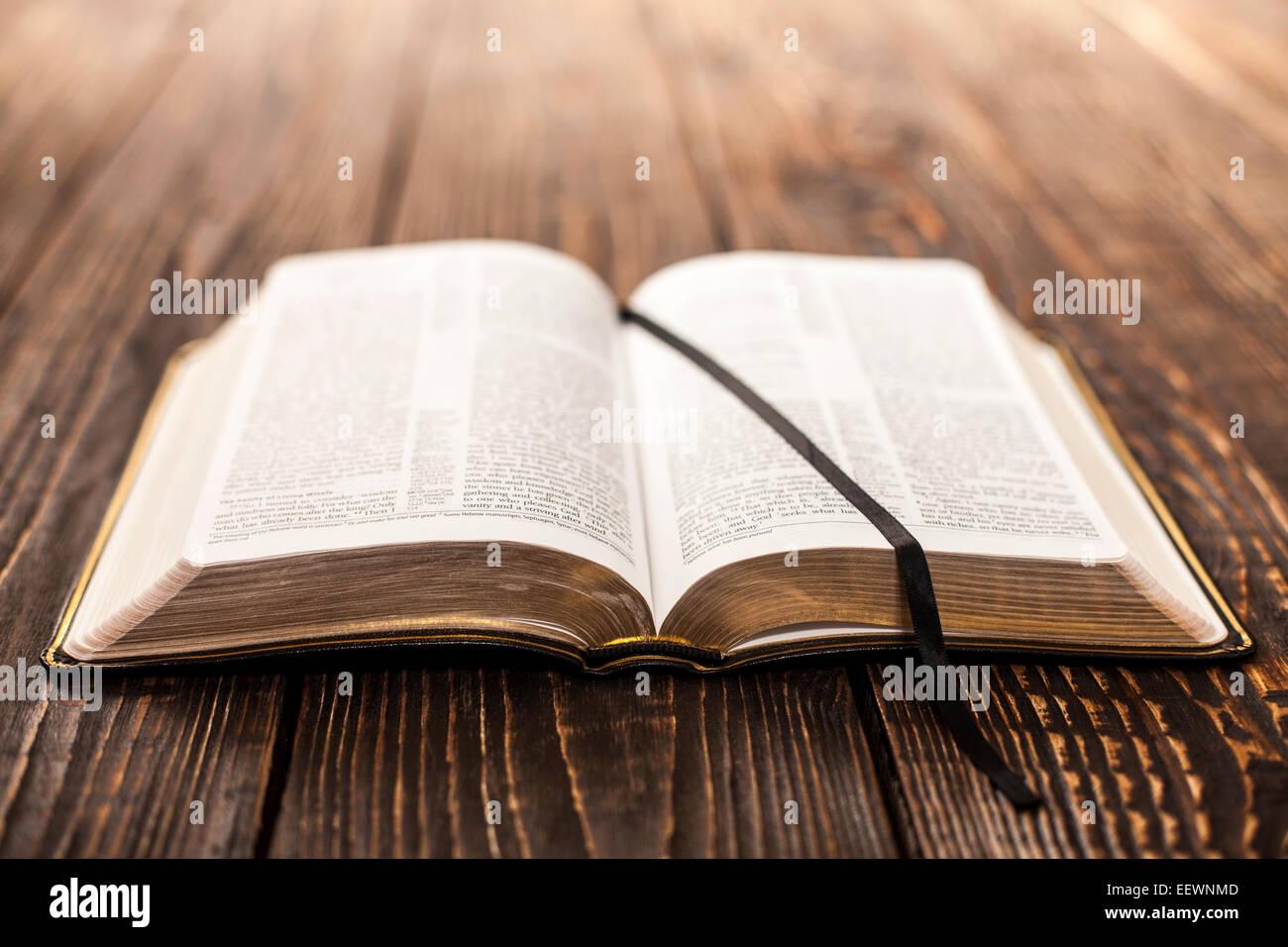 Open Book on wood background Stock Photo - Alamy