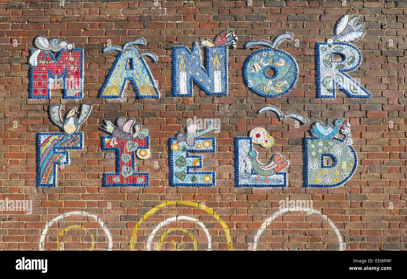 school sign on a brick wall Stock Photo - Alamy