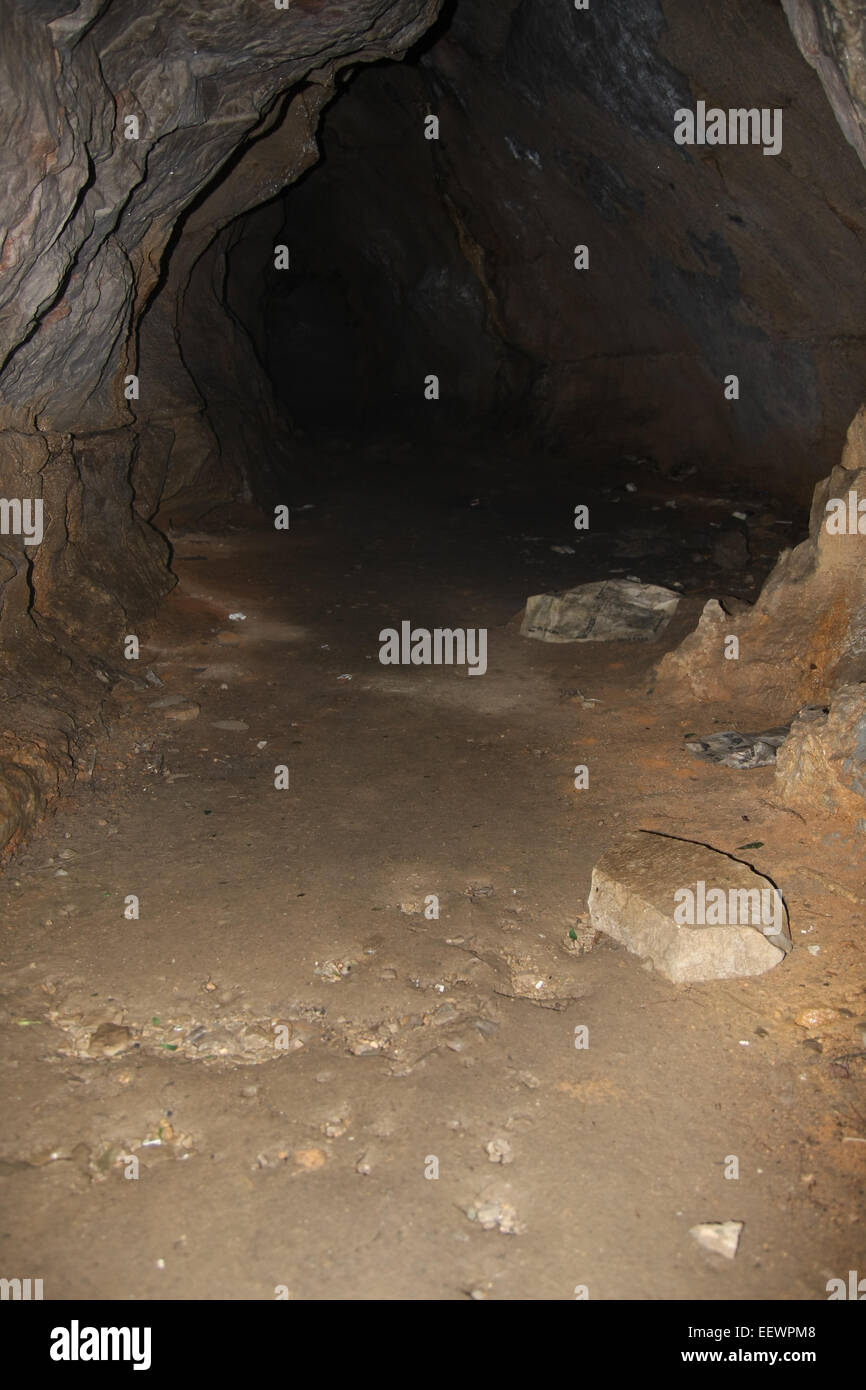 Scary deep cave Stock Photo - Alamy