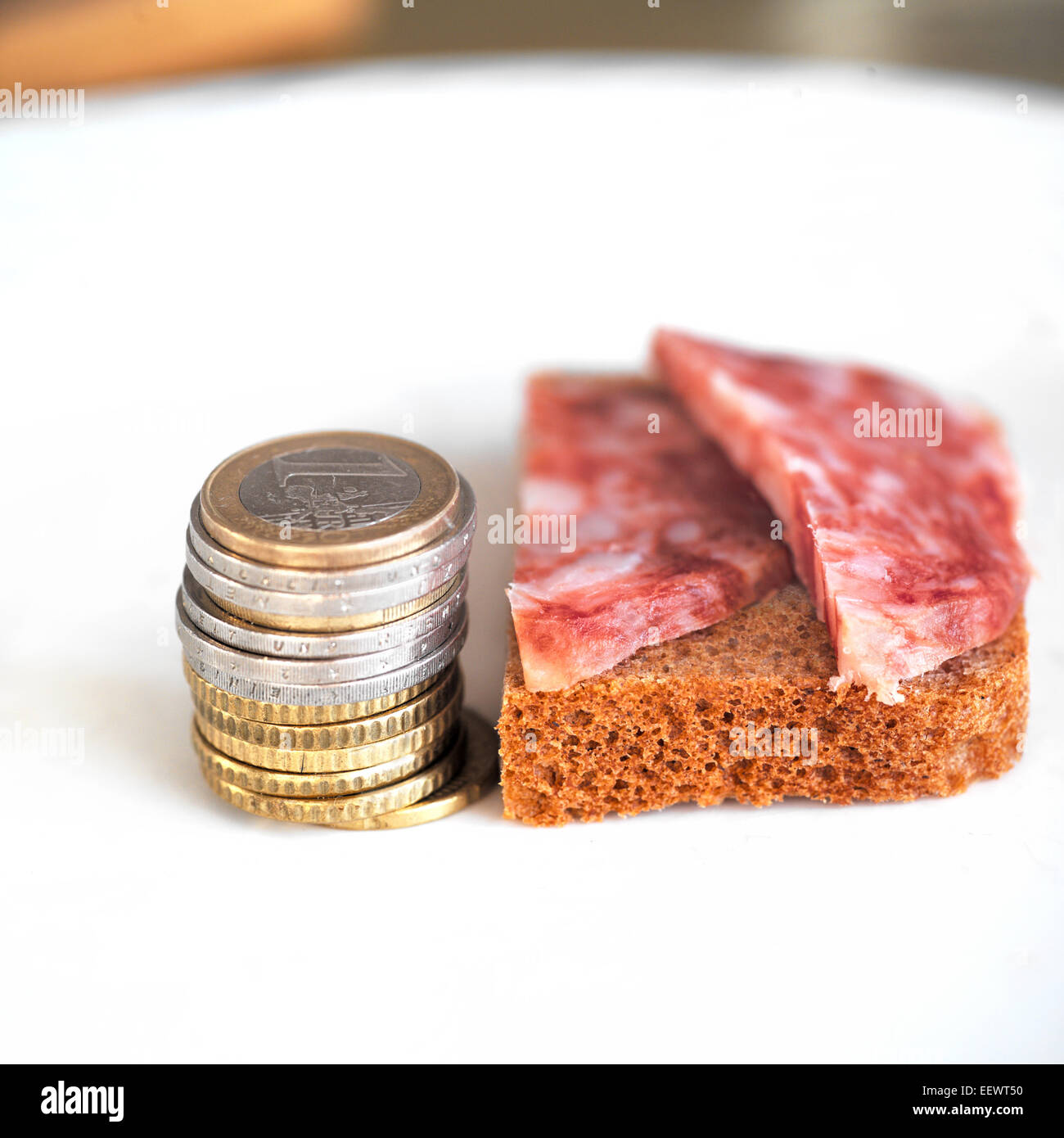 Coins and Salami Stock Photo - Alamy