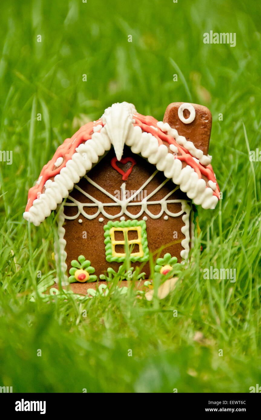 gingerbread house in grass Stock Photo - Alamy