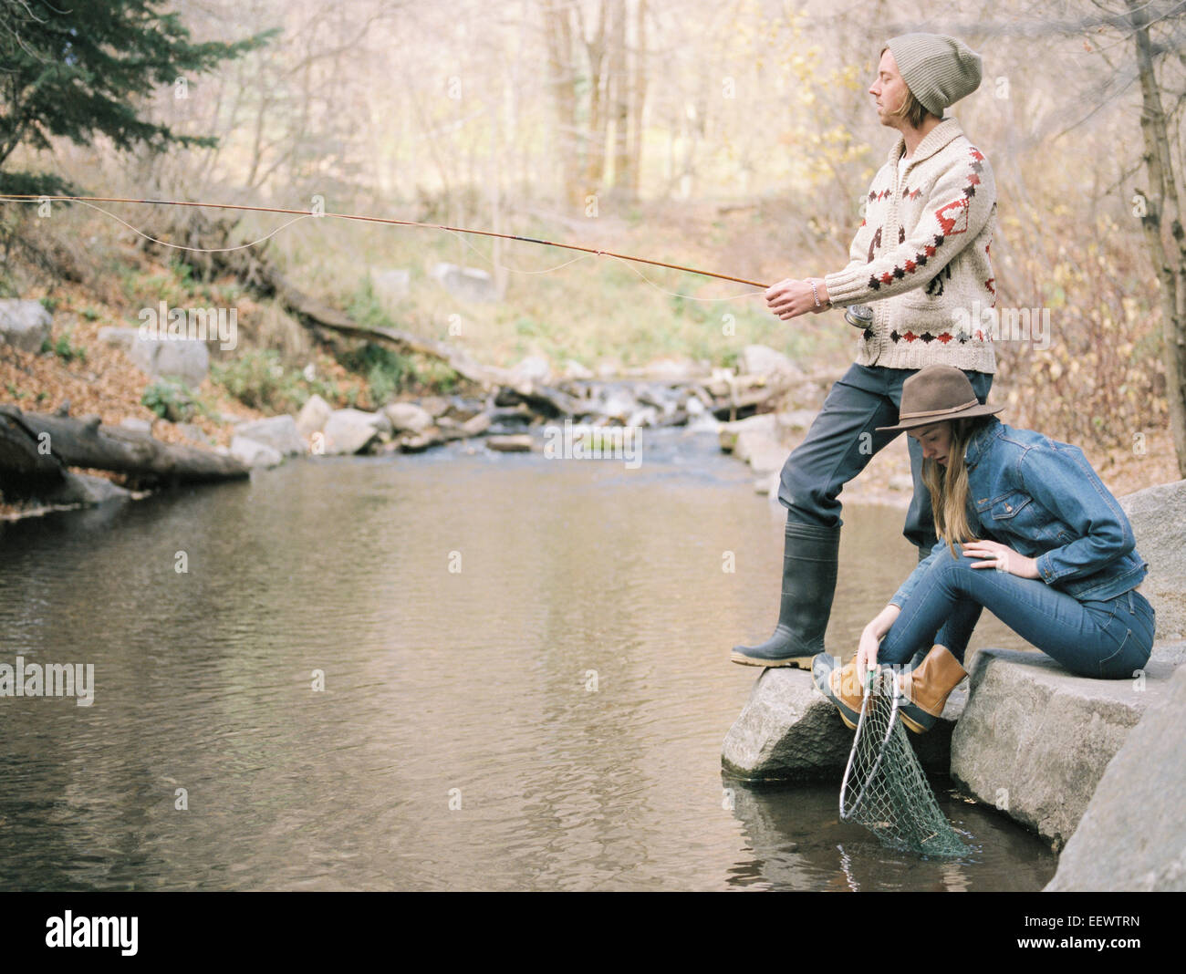 Young people fishing hi-res stock photography and images - Alamy