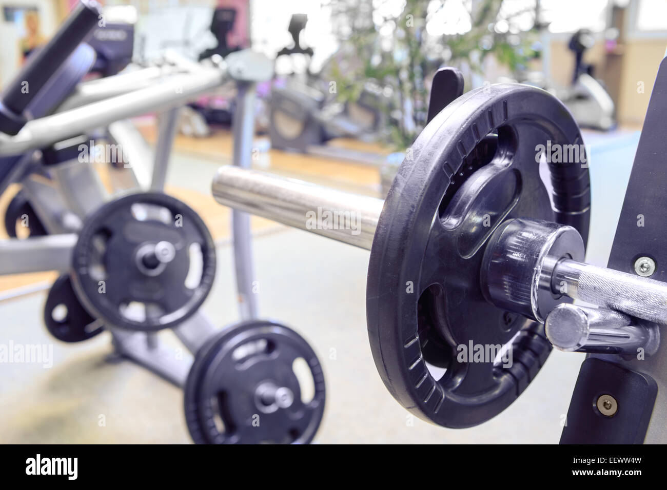 diverse equipment and machines at the gym room Stock Photo - Alamy