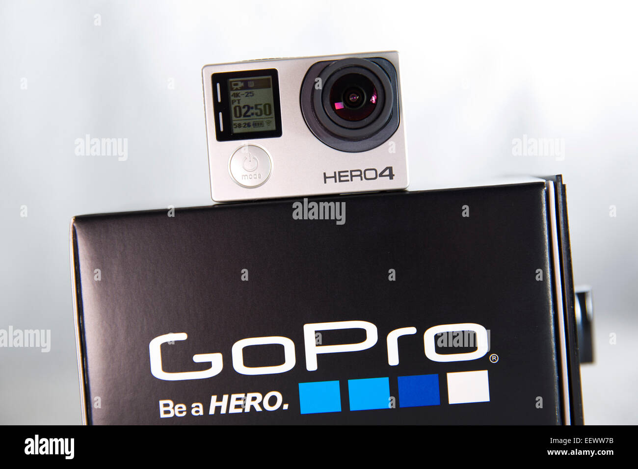 A GoPro Hero 4 Black edition is pictured in a studio on a white ...