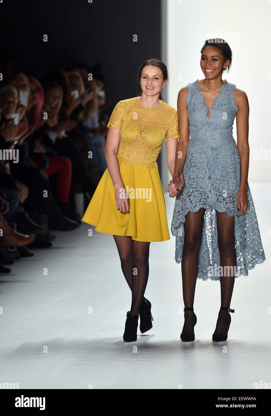 Designer Ewa Herzog and a model appear after the fashion show from Ewa ...