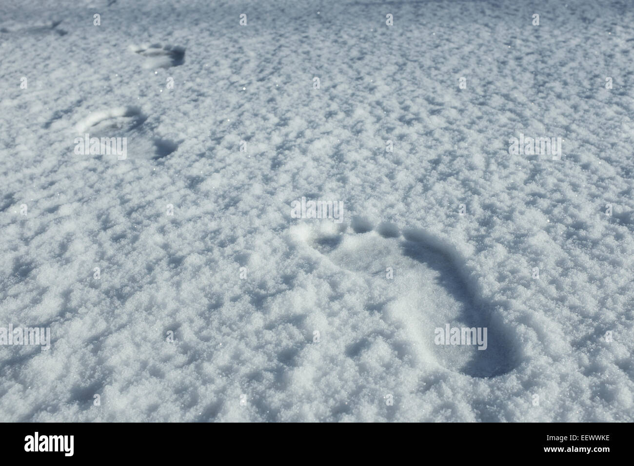 Barefoot in the snow hi-res stock photography and images - Alamy