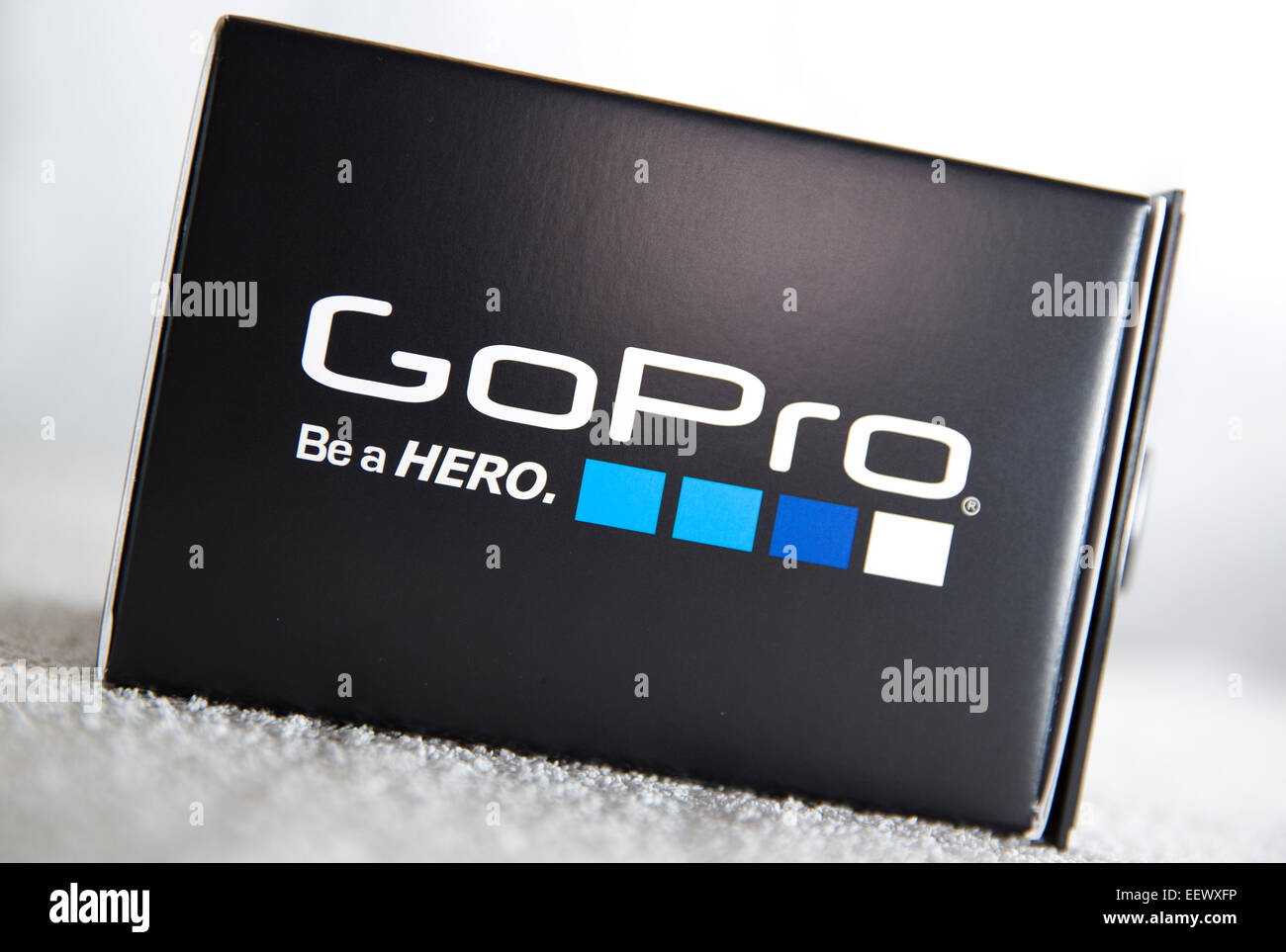 A GoPro Hero 4 Black edition box is pictured in a studio on a white ...