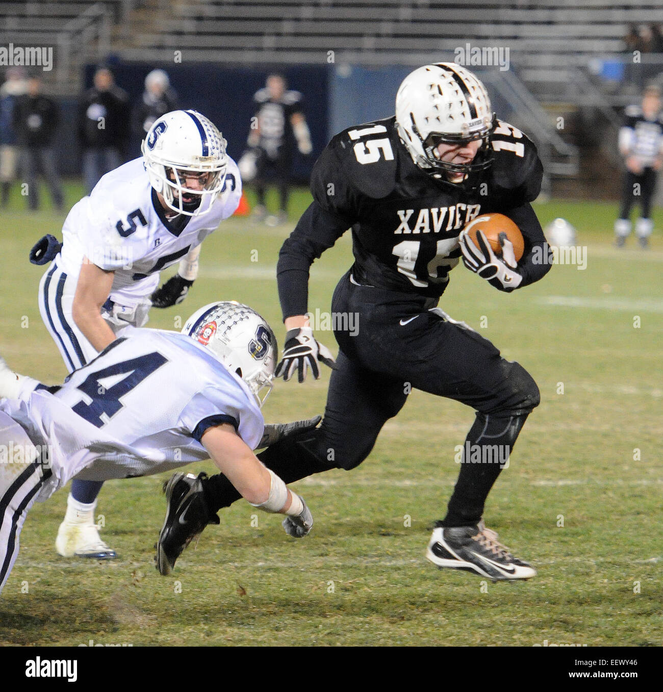 Hartford, CT USA-- Xavier's Matt Craig runs for a TD past Staples ...
