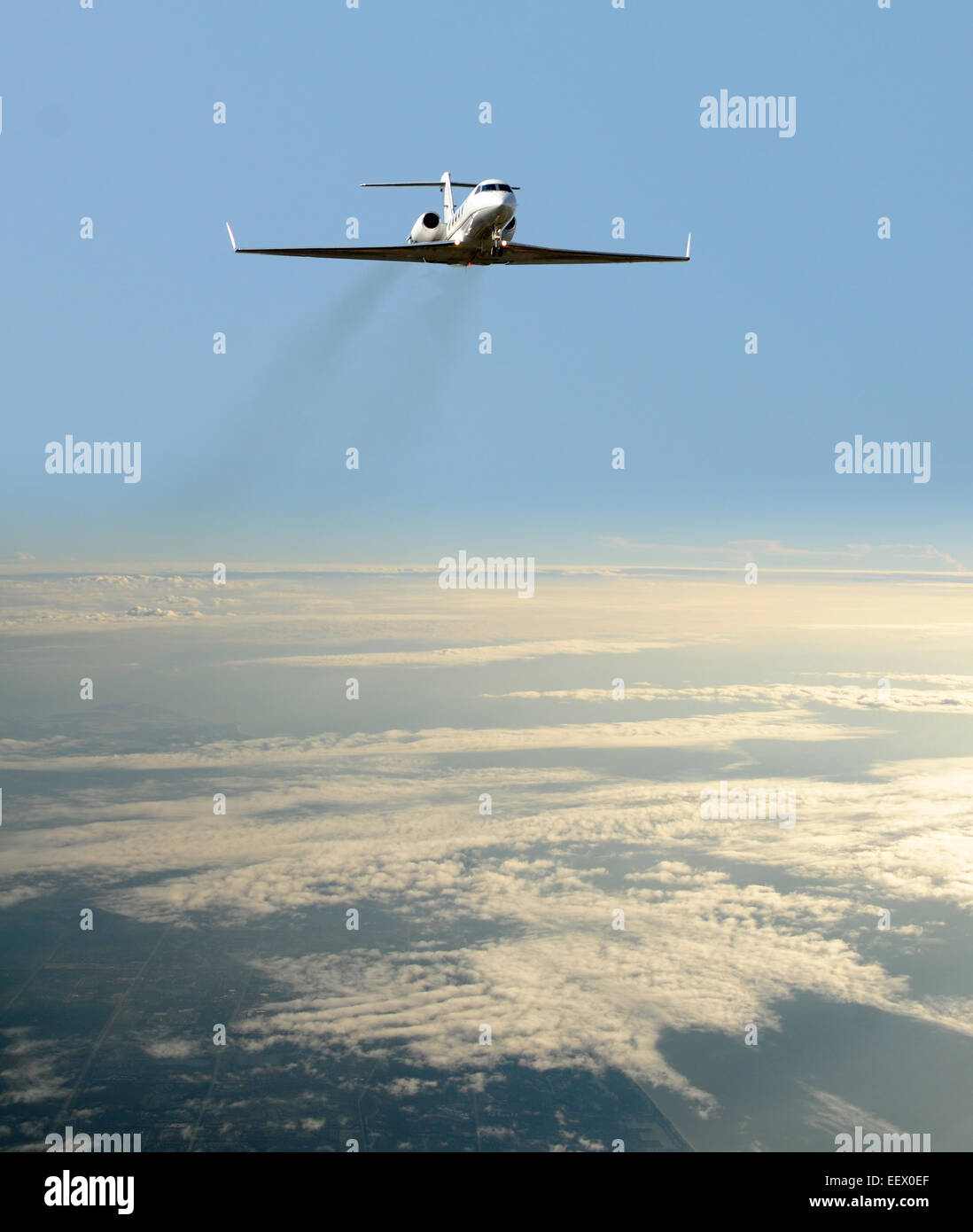 Luxury business jet flying at high altitude Stock Photo - Alamy