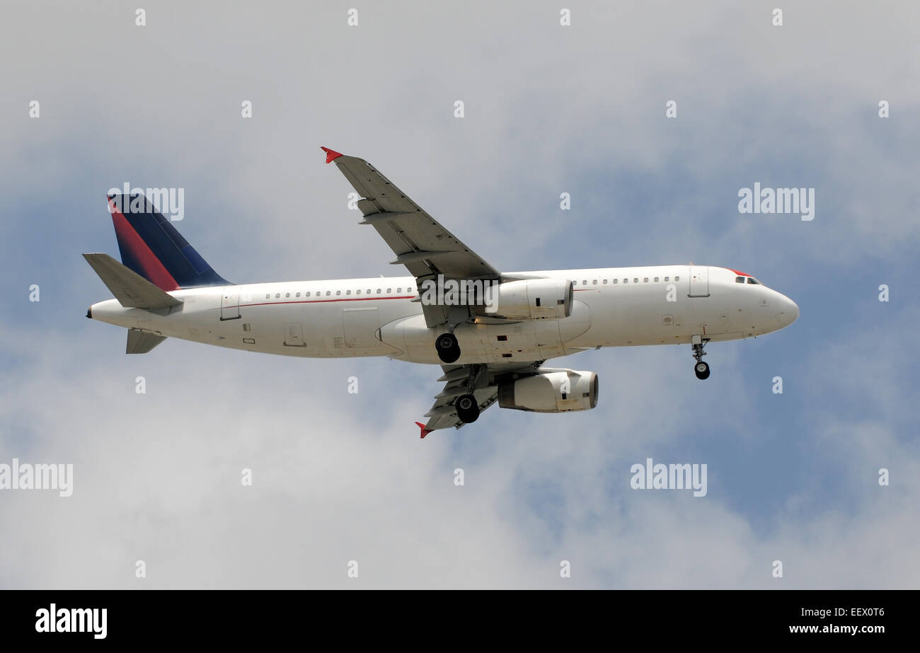 Modern passenger jet airplane in leveled flight Airbus A-320 Stock ...