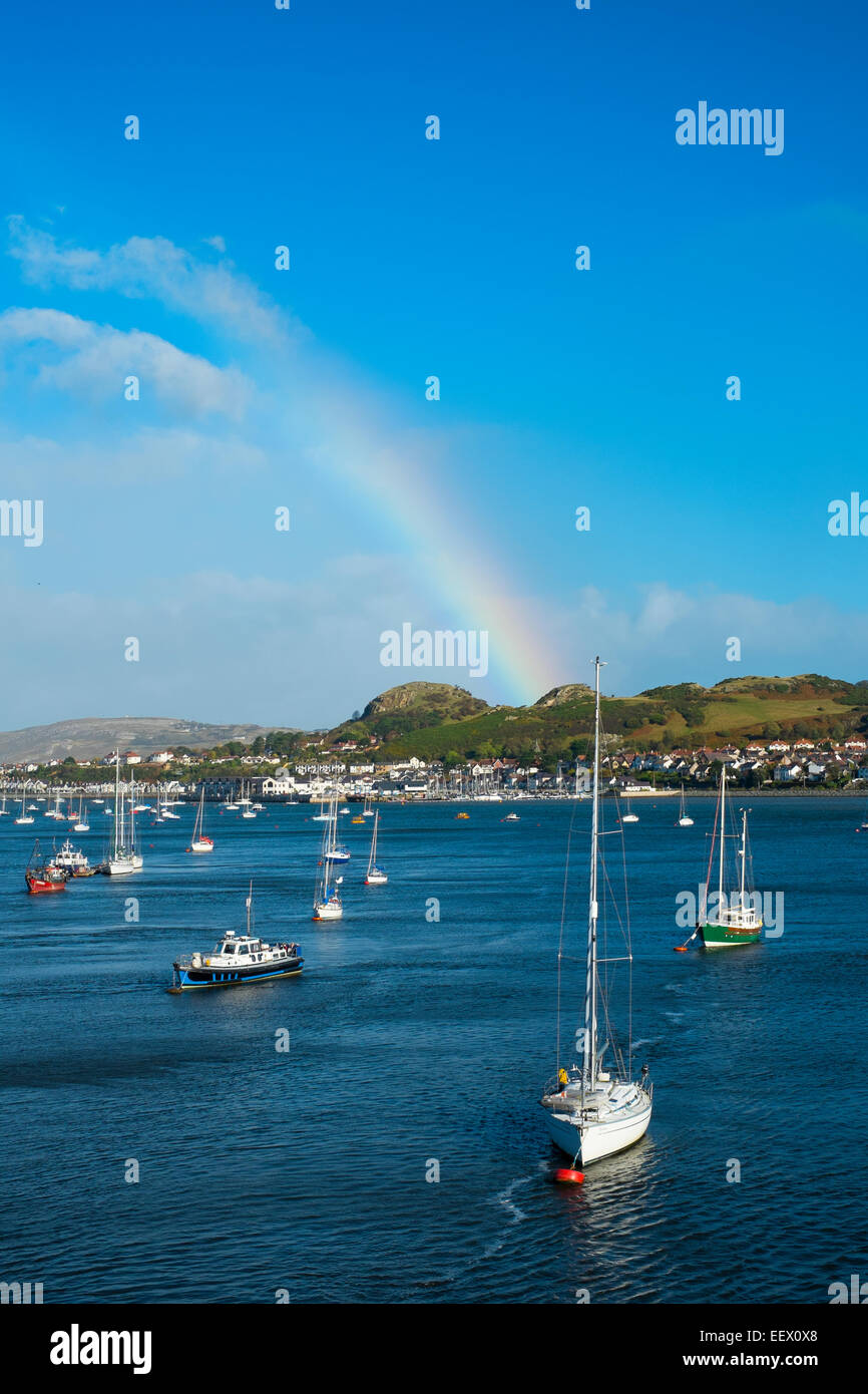 A rainbow over Conwy Bay looking at Deganwy, North Wales, UK Stock ...